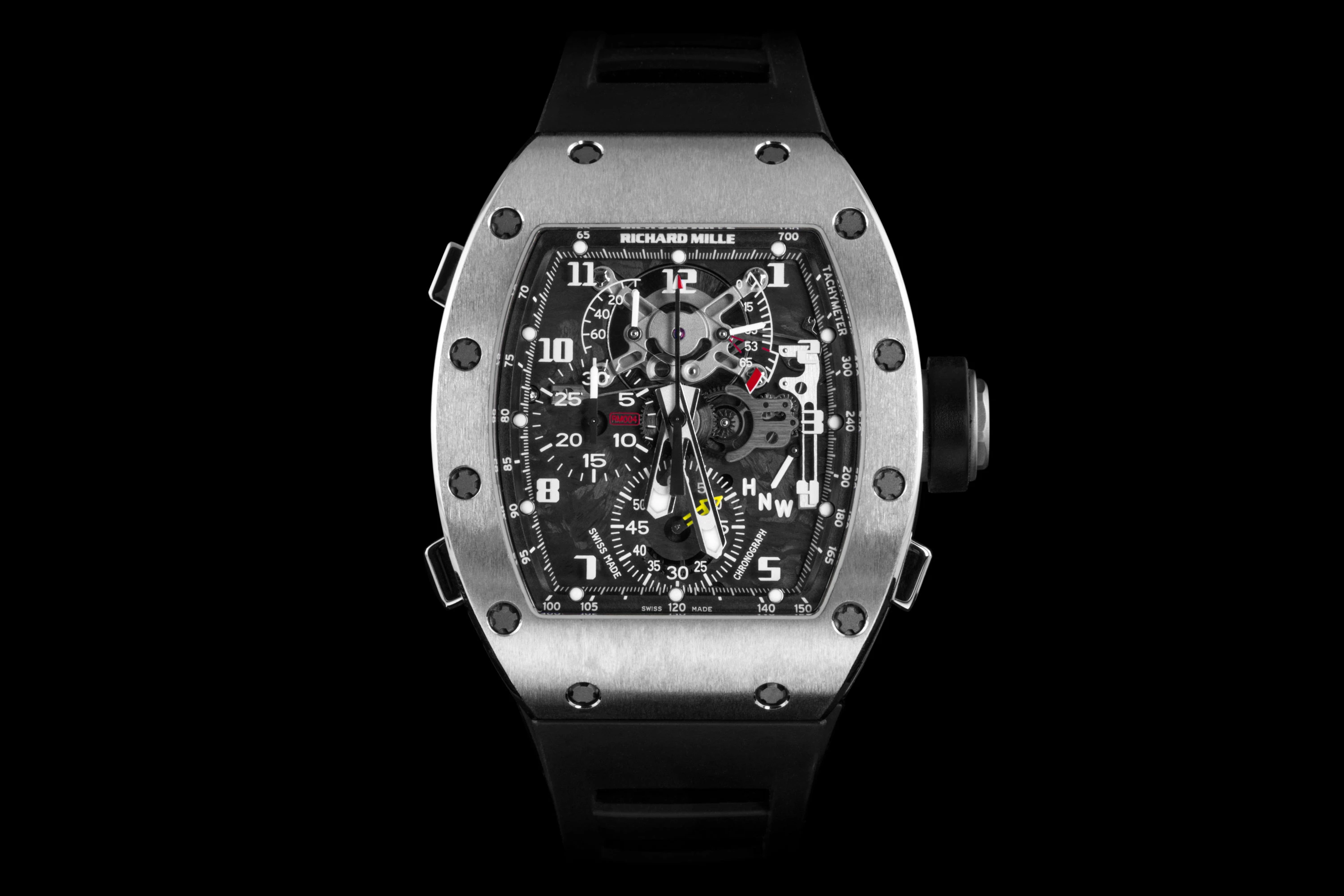 Richard Mille RM 004 Split Seconds Chronograph with a skeletonized dial, titanium case, and ...